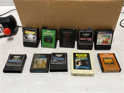 2 Colecovision Systems Many Atari Games And 2 Coleco Controllers