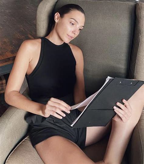 Gal Gadot Going Over The Contract For Which Adult Entertainment Company Scrolller