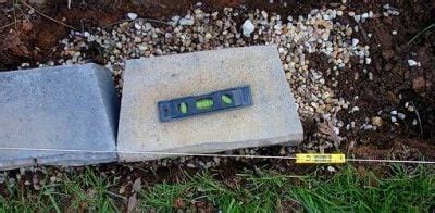 How To Level The Gravel Base For A Block Retaining Wall Today S Homeowner
