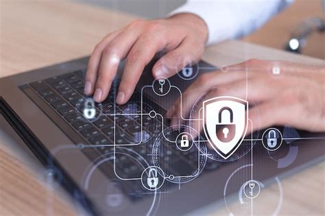 Premium Photo A Programmer Is Typing A Code On Computer To Protect A