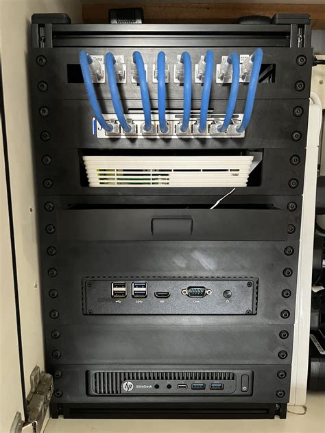 made a 3d printed 10 inch network rack for my home network running
