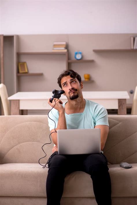 Young Man Playing Joystick Games At Home Stock Image Image Of Computer Joystick 262138443