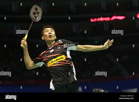 Malaysias Lee Chong Wei Jumps To Smash Against South Koreas Son Wan Ho In Their Quarterfinal