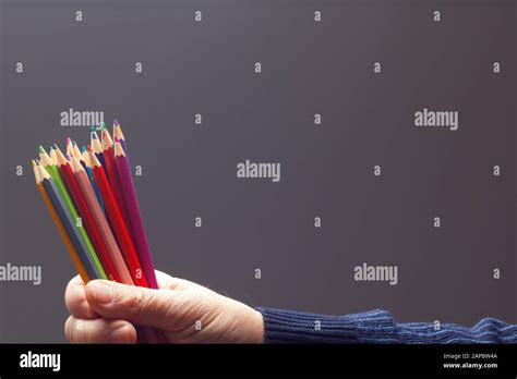Colors With The Sharp Point Group Of Colors United In The Hand Of An
