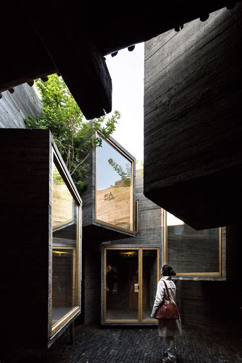 Micro Hostel With Tiny Concrete Rooms Installed By Zhang Ke In Old Beijing Hutong
