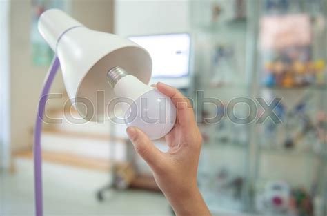 Changing The Bulb To LED To Install In Stock Image Colourbox