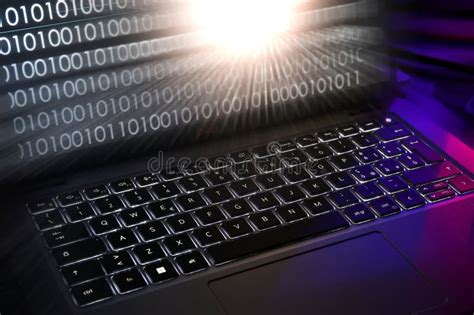 backlight keyboard of a modern laptop with sequences of 0s and 1s
