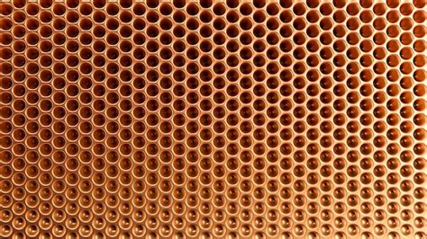 Premium Photo Textured Metallic Surface With Holes