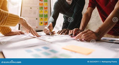 Ux Developer And Ui Designer Brainstorming About Mobile App Interface Wireframe Design With