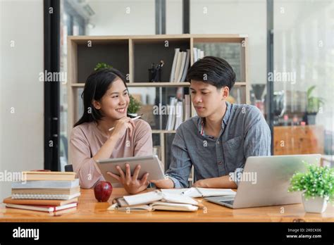 Education Teaching Learning Technology And People Concept Two Asian Male And Female Babes