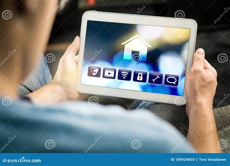 Man Using Smart Home Application In Tablet To Control House Stock Image Image Of Domotic