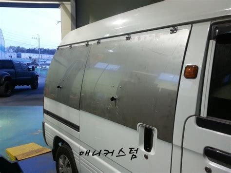 다마스 바겐버스 레이튜닝루프케리어루프렉케리어바스켓사이드어닝락슬라이더애니커스텀사이드발판rv코란도c겔로퍼