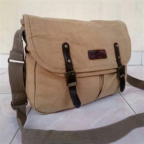 Tas Selempang Canvas Ex Import Merk Sexy Lion Fesyen Pria Tas Dompet Di Carousell