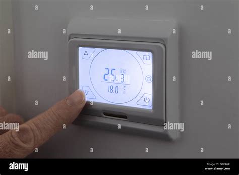 Person Adjusting Digital Thermostat Stock Photo Alamy
