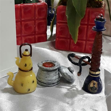 ست مینیاتوری جذاب مناسب تمام مکان ها و ماکت خانه های روستایی قلیون 7سانت کتری قوری 4 سانت با