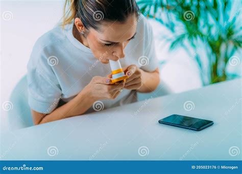 Woman Using Spirometer Measuring Lung Capacity And Force Expiratory Volume Stock Photo Image
