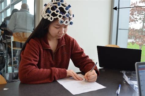 Participant Taking The Math Test Whilst Undergoing Eeg Examination