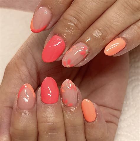 15 Coral Nail Ideas For Summer Featuring Jelly Polishes And Aura Designs