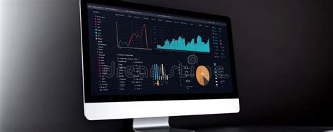 Close Up Of A Desktop Computer Displaying Data Charts And Graphs On The