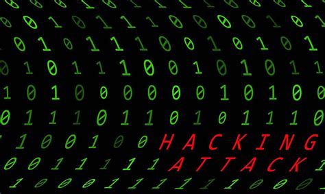 Black Background Featuring Binary Code With A Warning Of A Hacking