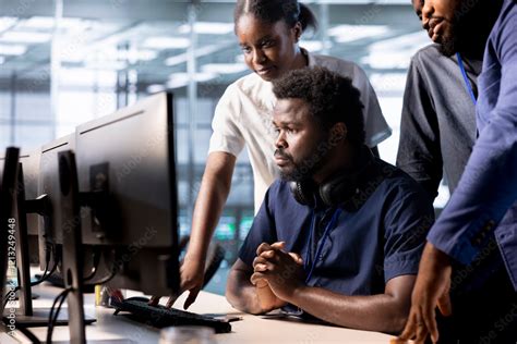 team of data center employees working together to create technical documentation for software