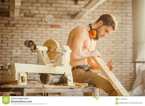 Carpenter Using Straightedge To Draw Line On Board Stock Image Image