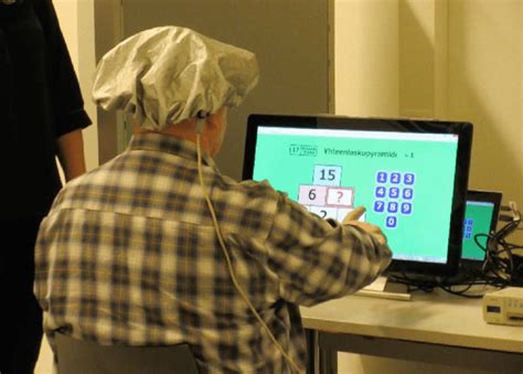 Nirs Device Being Used For An Elderly Person Form The Finnish Test