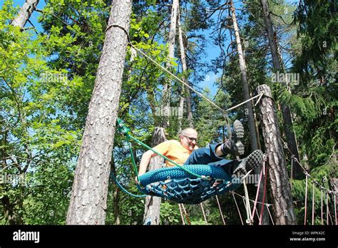 Adult Tree Swing Hi Res Stock Photography And Images Alamy