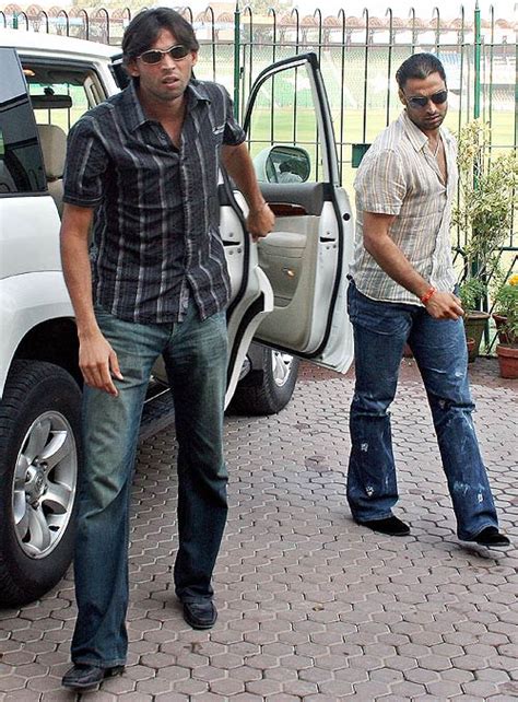 Mohammad Asif And Shoaib Akhtar Arrive At The Gaddafi Stadium For A Hearing On Doping Charges