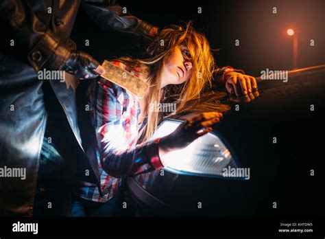 Unconscious Female Victim On Car Hood Serial Maniac With Knife