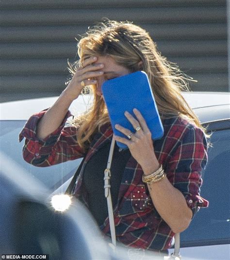Elsa Pataky Puts An Ice Pack On Her Face As She Arrives Back In Byron