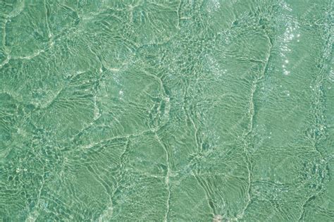 Premium Photo Clear Sea Water Surface Beach Reflection Aqua Texture Of The Water Surface