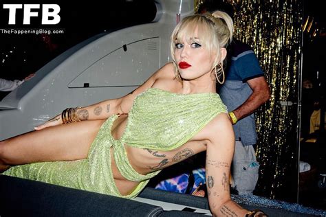 Miley Cyrus Poses Without Underwear In A Sexy Revealing Dress 10