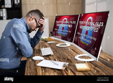 ransomware cyber attack showing personal files encrypted screen stock