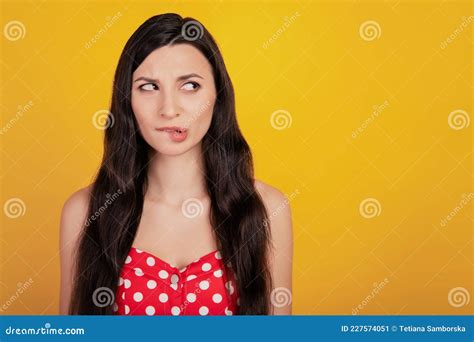 Portrait Of Uncertain Nervous Woman Bite Lip Look Empty Space Wear