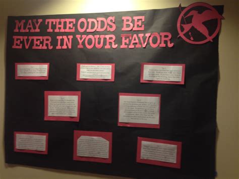 hunger games themed ra passive program bulletin board with tips for final exams may the odds