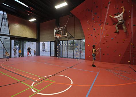 Concrete Sports Hall By Idis Turato With Faceted And Bumpy Facades