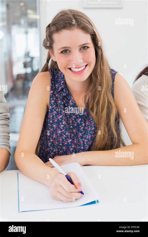 Babe Taking Notes In Class Stock Photo Alamy