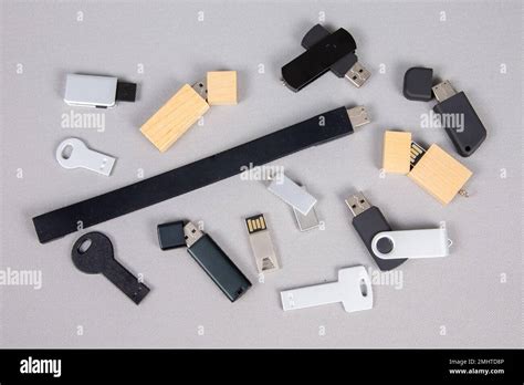 USB Flash Drive Memory Sticks Keys On White Background In Flat Style For Advertising Branding