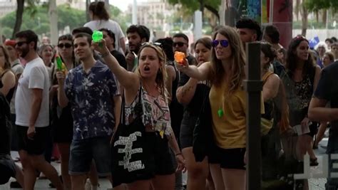 Spanish Protesters Squirt Water At Barcelona Tourists Go Home