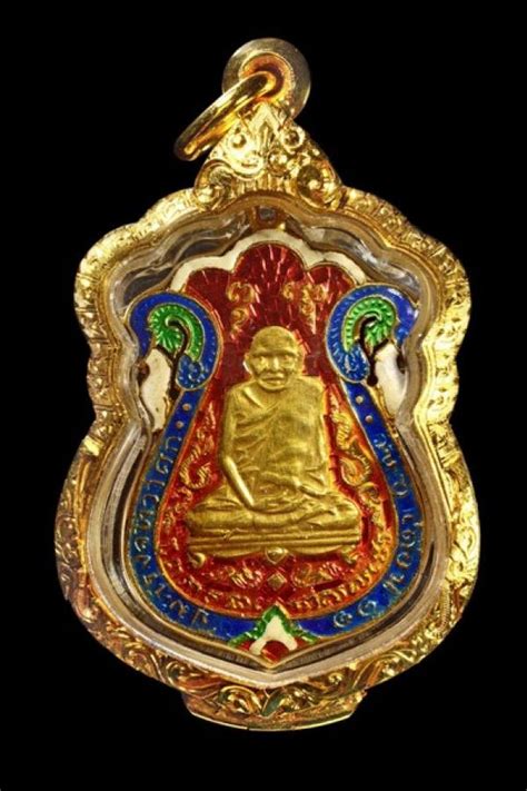 หลวงปู่เอี่ยม วัดหนัง ลงยาห้าสีทองคำ ยันต์ 4 ปี 2467 ทางเรารับตรวจเช็คพระเป็นการใช้เครื่องฟลู