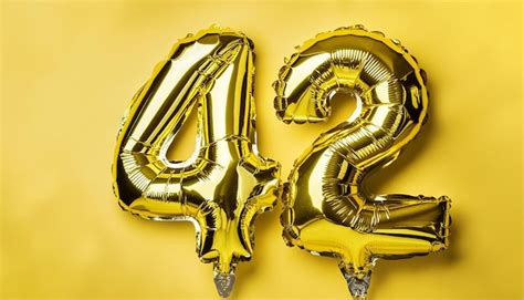 Banner With Number 42 Golden Balloon 42 Years Anniversary Celebration Yellow Background Closeup