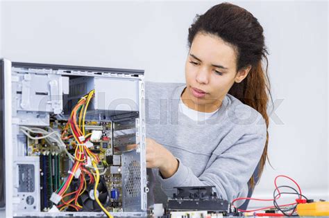 Babe Woman Attempting To Repair A Computer Stock Image Colourbox