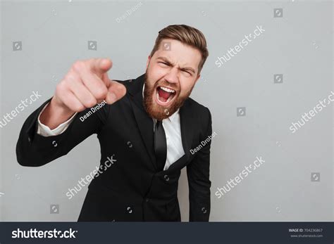 Angry Furious Businessman Suit Shouting Pointing Stock Photo 704236867 Shutterstock