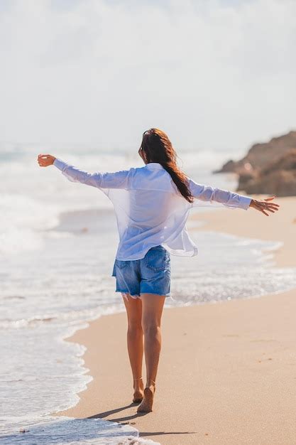 Premium Photo Young Happy Woman On The Beach Enjoy Her Summer