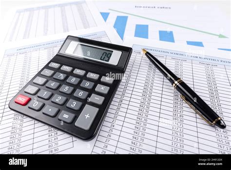 Amortization Schedule Documents With Calculator Stock Photo Alamy