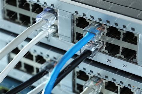 Premium Photo Ethernet Cables Connected To Network Switch Close Up