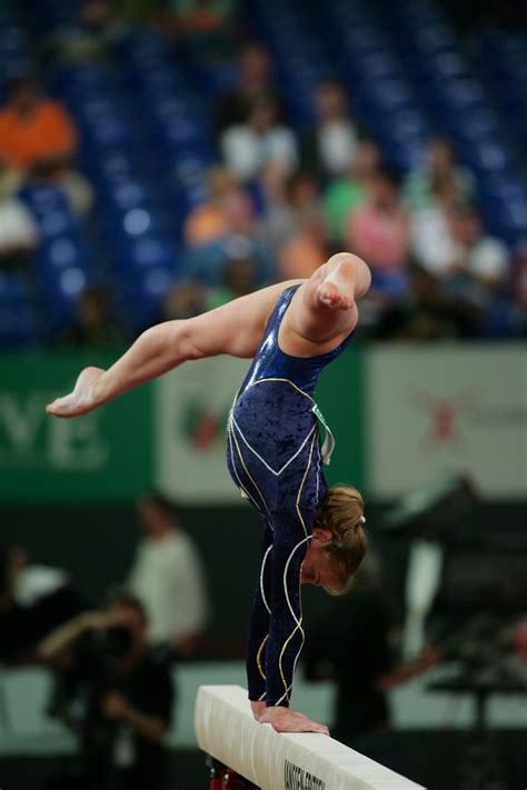 Artistic Female Gymnast Julie Martinez Fra Performing Her Routine On
