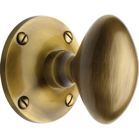 Large Victorian Oval Mortice Door Knobs On Rose In Antique Brass From