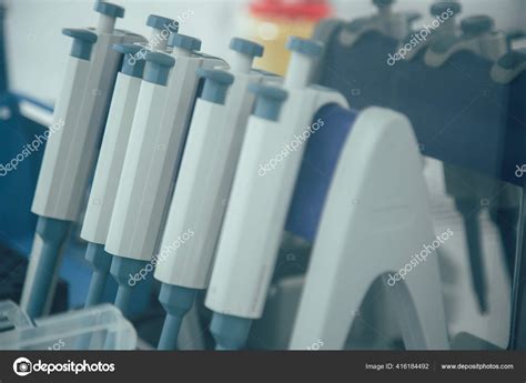 Close Row Automatic Pipette Dispensers Blue White Plastic Casing